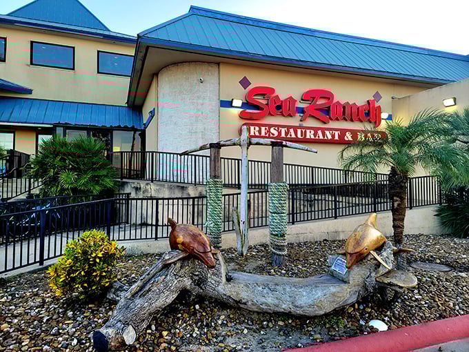 Sea Ranch's bright blue roof stands like a beacon for hungry travelers. The promise of fresh Gulf shrimp awaits inside!
