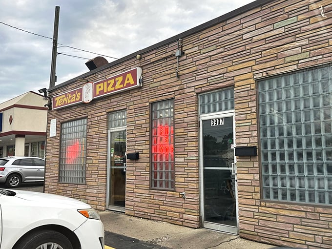 Terita's stone facade and glass block windows aren't just retro cool &ndash; they're guardians of pizza secrets worth crossing town for.