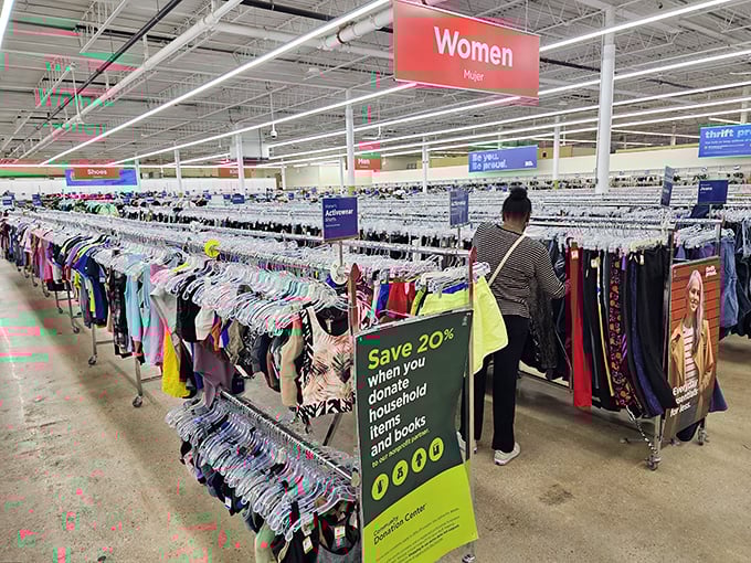 Endless racks of possibility! Unique's women's section stretches far into the distance, like a fashion explorer's dream map.