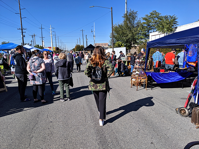 Where strangers become fellow treasure hunters. The Urban Flea Market transforms ordinary streets into aisles of possibility.