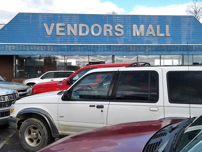 That blue sign promises adventure! Vendors Mall's unassuming exterior hides a labyrinth of treasures waiting to be discovered.
