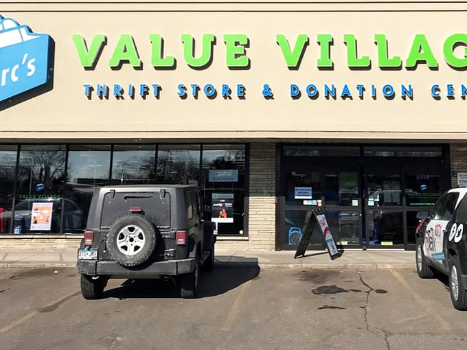 The cheerful blue and green signage of Arc's Value Village hints at the colorful treasures waiting inside.