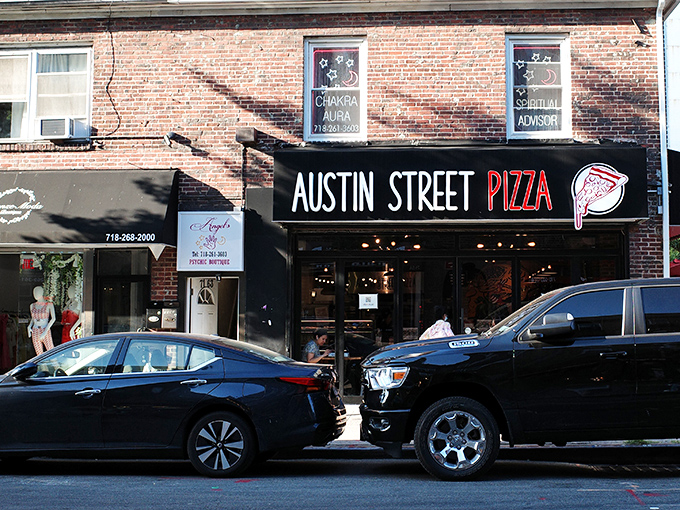 Black awnings and brick walls hide pizza treasures inside. Austin Street knows great food doesn't need fancy packaging.