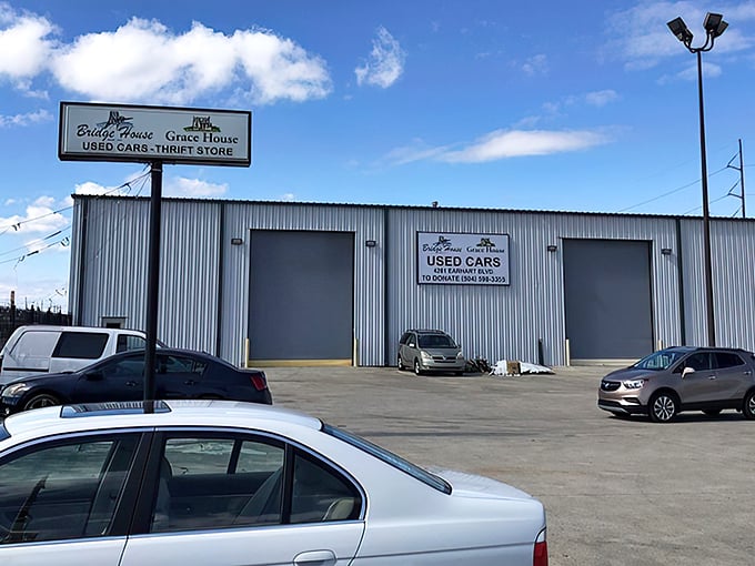 The Grace House sign promises not just used cars, but a thrift store adventure where one person's castoffs become your jackpot.