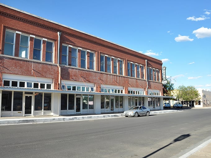 Deming's red-brick downtown stands proudly against the desert sky, a testament to small-town perseverance in the vast southwestern landscape.