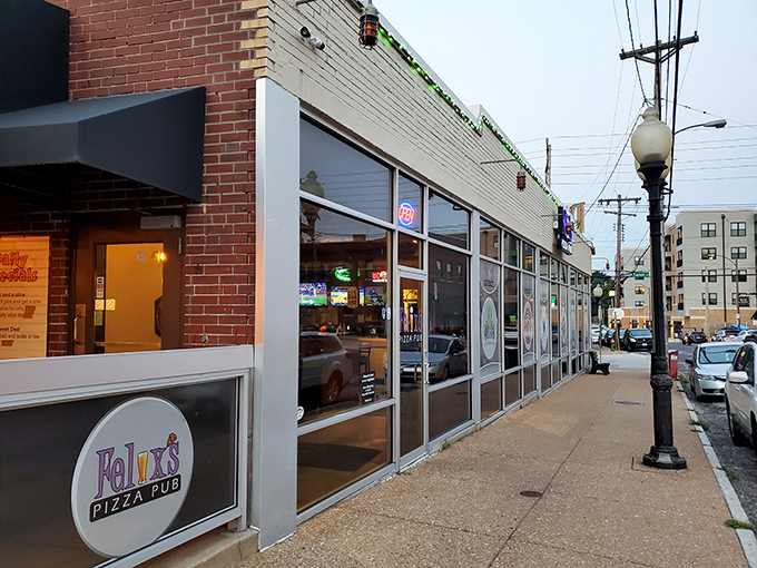 Corner spot charm meets pizza perfection - those big windows reveal the magic happening inside this Clayton Avenue favorite.