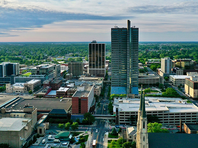 The sun catches Fort Wayne's skyline just right, illuminating a city where big-city amenities come without the big-city price tag.