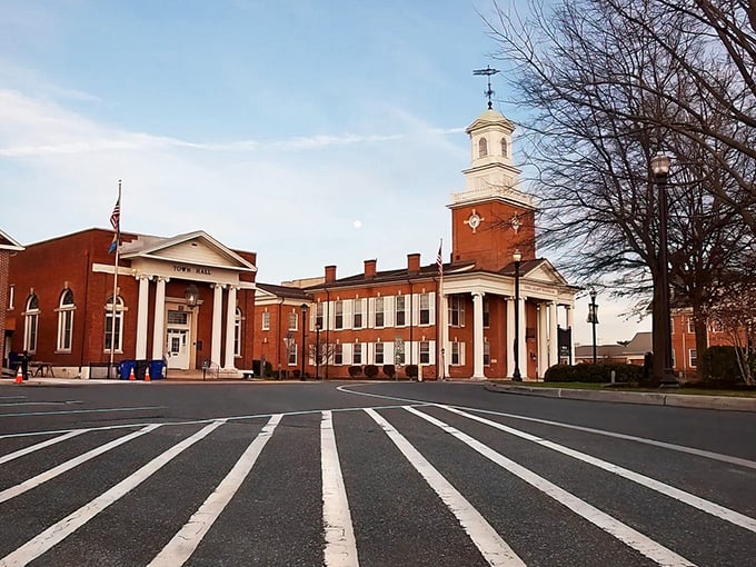 The stately red brick courthouse anchors Georgetown's town circle, a testament to Delaware's rich history and community-centered design.