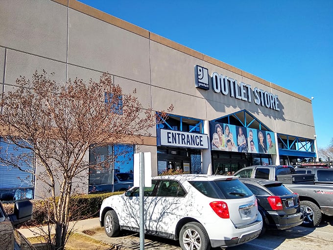 The "Outlet Store" sign promises what lies within &ndash; a bargain hunter's paradise where treasures are sold by the pound.