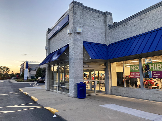 Sunset shopping at its finest. Goodwill's inviting entrance glows with the promise of hidden treasures inside.