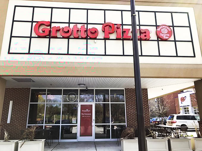 Red awnings and pizza perfection - sometimes the strip mall locations hide the best sauce secrets in Maryland.