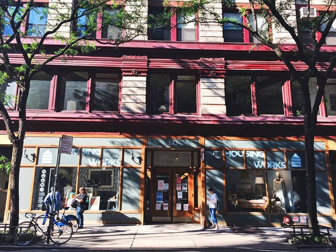 Sunlight streams onto this Manhattan sidewalk, inviting passersby into a world of secondhand treasures.