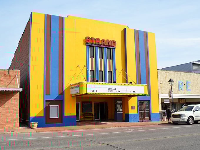 The Strand Theatre's sunshine-yellow Art Deco facade brightens even the cloudiest Louisiana day – a splash of Hollywood glamour in small-town Jennings.
