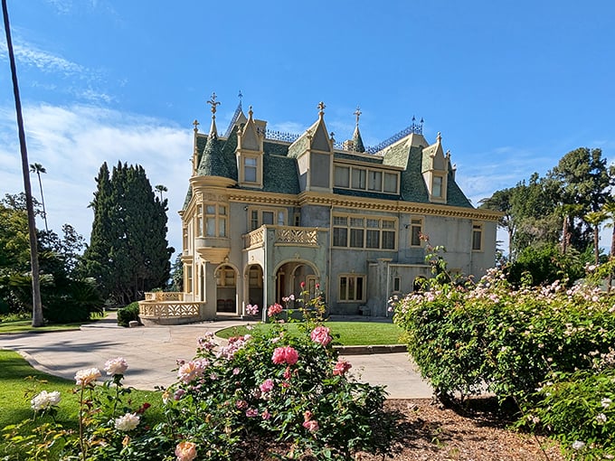 Garden paradise alert! Those pink roses and manicured grounds are begging you to sip tea and pretend you're nobility.