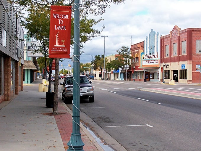 Small-town magic in Lamar! These historic storefronts have witnessed generations of community life, with outdoor seating perfect for people-watching and coffee-sipping.