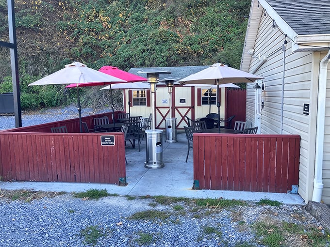 Those red fences and patio umbrellas aren't just for show &ndash; they're protecting the sacred ritual of outdoor steak enjoyment.