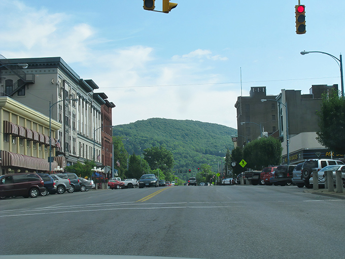 The warm red brick buildings of Olean's downtown stand as proud sentinels of small-town commerce and community connection.