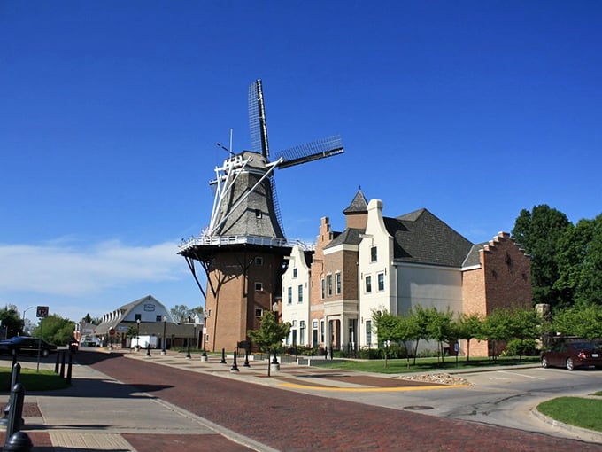 Pella's Dutch heritage shines through its distinctive architecture. That windmill isn't just for show&mdash;it's the heart of this charming community!