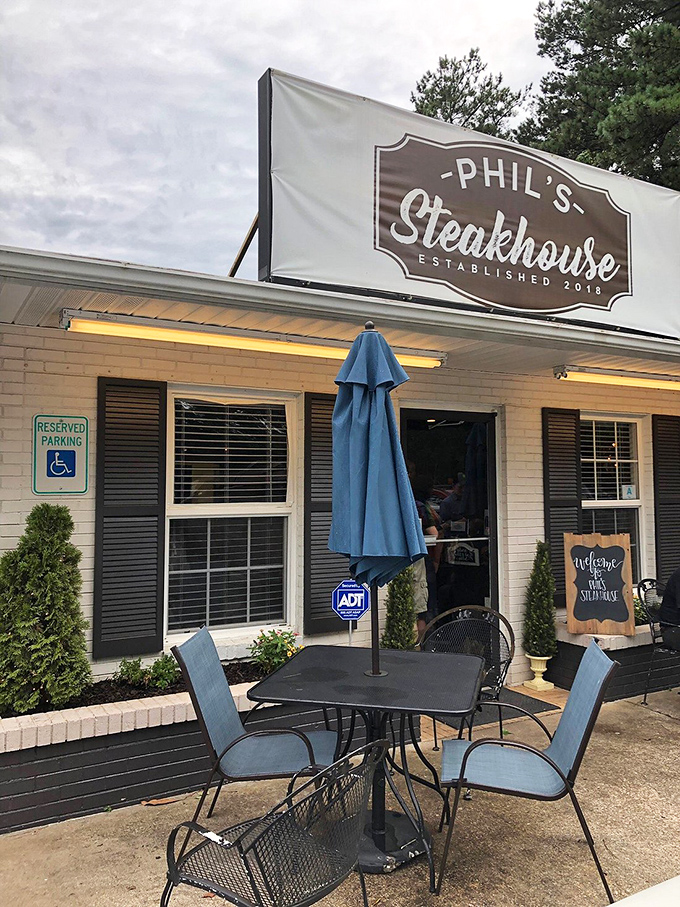 That blue umbrella isn't just for show&mdash;it's where you'll sit contemplating life after experiencing Phil's perfect ribeye.