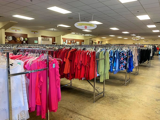 A rainbow of organized clothing awaits at Salvation Army. Each rack tells a different fashion story&mdash;some with happier endings than others!