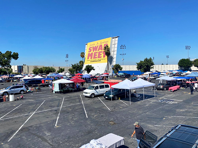 Morning at Santa Fe Springs Swap Meet: where early birds catch deals under palm trees and blue skies.