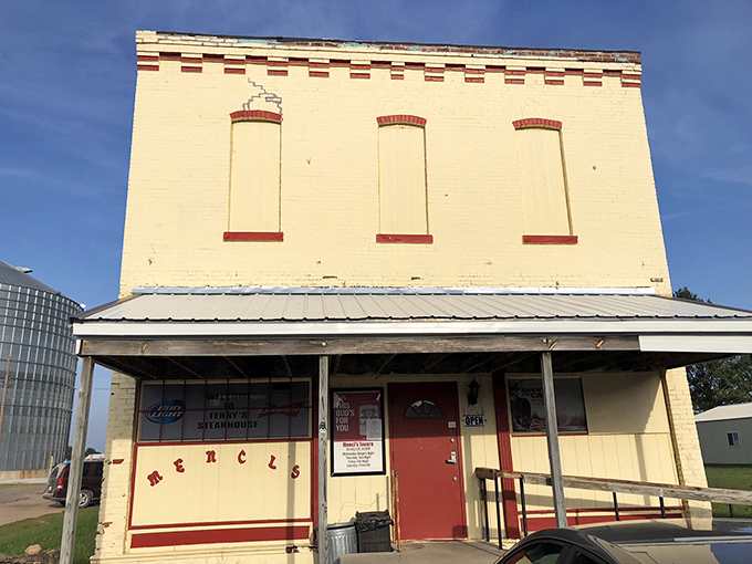 This cream-colored brick building might not scream "food paradise," but locals know it whispers "best steak in the county."