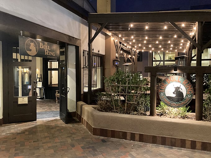 By night, The Bull Ring transforms with twinkling lights. Like Vegas for meat lovers, but with better odds of a satisfying payoff!