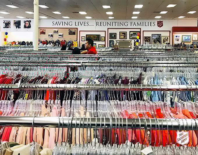 Rainbow racks stretch to the horizon at this Salvation Army superstore. Each colorful garment represents both savings and community support.