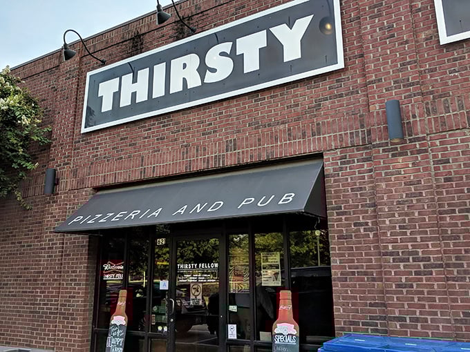 No pretension, just pizza perfection. Thirsty Fellow's classic pub exterior hints at the comfort food treasures hiding inside.