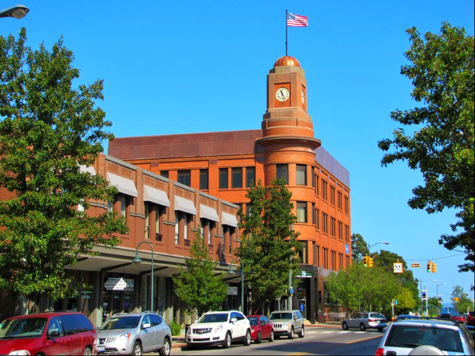 Traverse City's clock tower: "Time moves differently here, where your retirement dollars last longer against this iconic backdrop of small-city splendor."