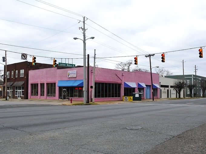 The pink building at this intersection might not win architectural awards, but it represents the affordable charm that makes Tuscaloosa a retiree's dream.