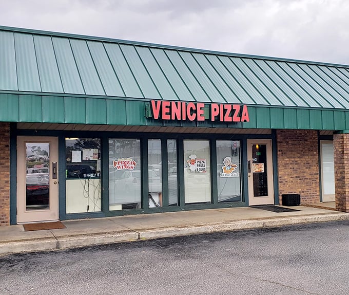 Behind that modest green awning and simple signage lies pizza perfection that would make any Manhattan cabbie feel right at home.