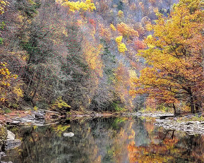 The colors! Worlds End's autumn reflection looks like Mother Nature showing off her painting skills on a liquid canvas.