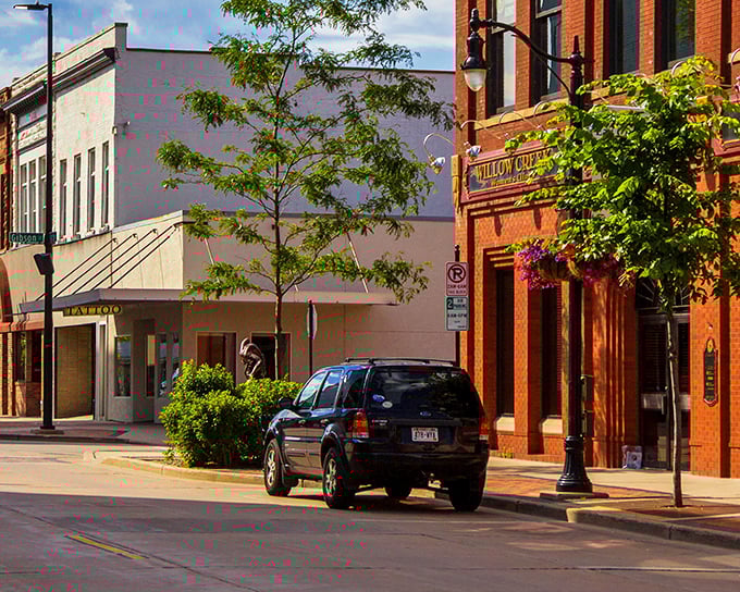 Sunlight plays across Barstow Street's colorful facades, creating that perfect small-town tableau. Even the trees seem positioned by a movie set designer.