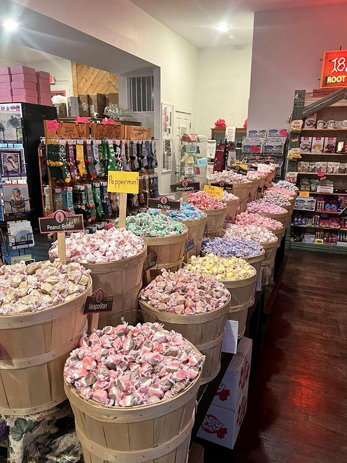 Wooden barrels overflow with colorful taffy in flavors from classic strawberry to adventurous pickle. Life's too short for boring candy choices!