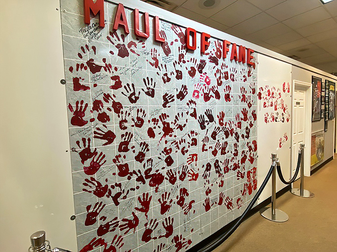 The "Maul of Fame" wall showcases bloody handprints from horror royalty who've made their mark on zombie culture.