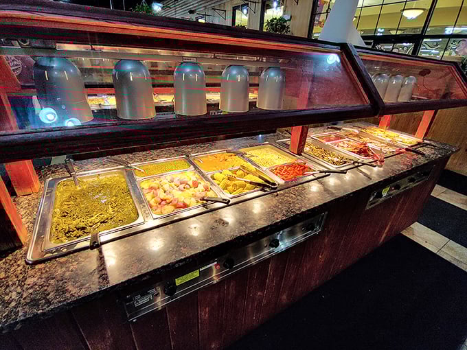 A rainbow of Southern sides stretches before you like a culinary yellow brick road. Each steaming tray holds another chance at happiness.