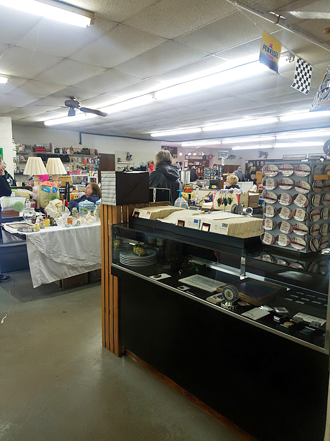 Every aisle tells a different story as shoppers navigate this labyrinth of memories, each corner promising unexpected discoveries.