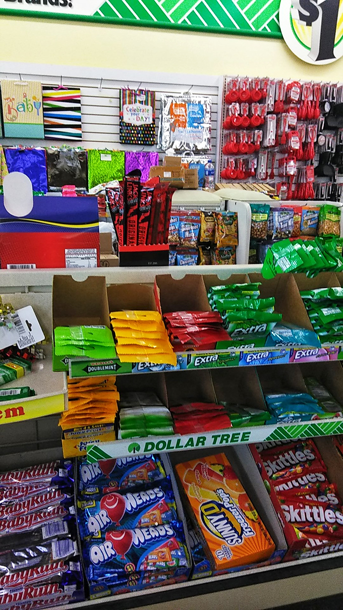 Colorful temptations line the candy aisle, where name brands like Skittles and Airheads offer sweet satisfaction for pocket change.