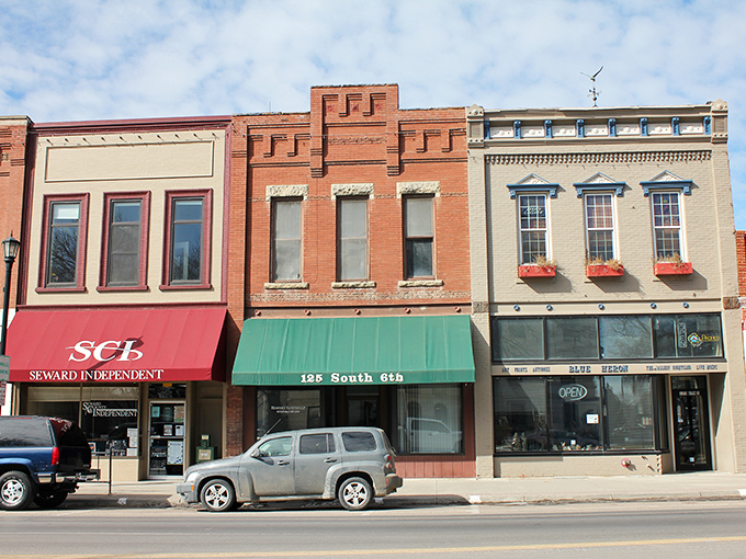 The Seward Independent's red awning stands as a reminder that local journalism still matters in places where neighbors know each other's names.