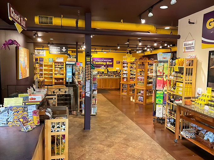 Yellow pipes overhead guide visitors through this condiment wonderland, where every shelf promises new flavor adventures waiting to be discovered.