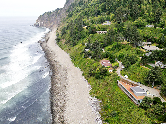 Nature's perfect sandwich: ocean waves on one side, lush mountainside on the other, with a thin crust of beach connecting these magnificent giants.