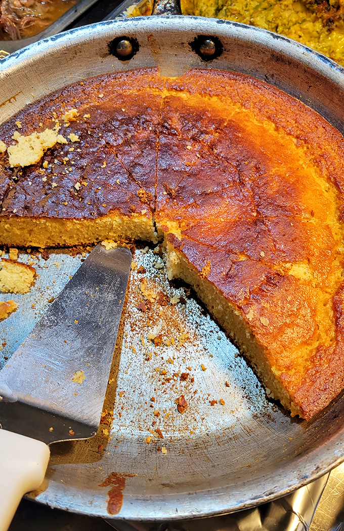 This cornbread doesn't just sit on the plate&mdash;it commands attention with its golden-brown crust and moist interior. Grandmothers everywhere would approve.