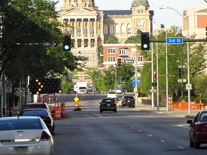 All roads lead to the Iowa State Capitol, standing proud like a gilded wedding cake at the end of this tree-lined boulevard.
