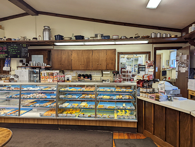 This display case isn't just furniture&mdash;it's a museum of edible art where every shelf tells a delicious story waiting to be devoured.