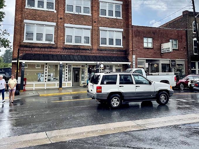 Historic brick buildings frame Floyd's downtown district, where three-story structures feel like skyscrapers and everyone still waves to passing cars.