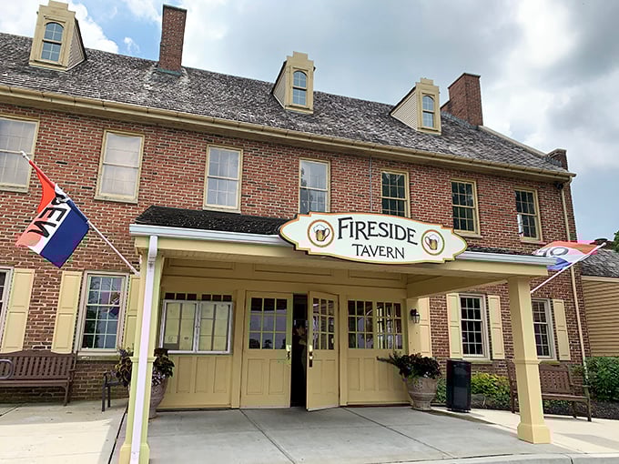 The Fireside Tavern's colonial brick facade and welcoming entrance practically whisper, "Come in, sit down, and forget about that diet you were planning to start tomorrow."
