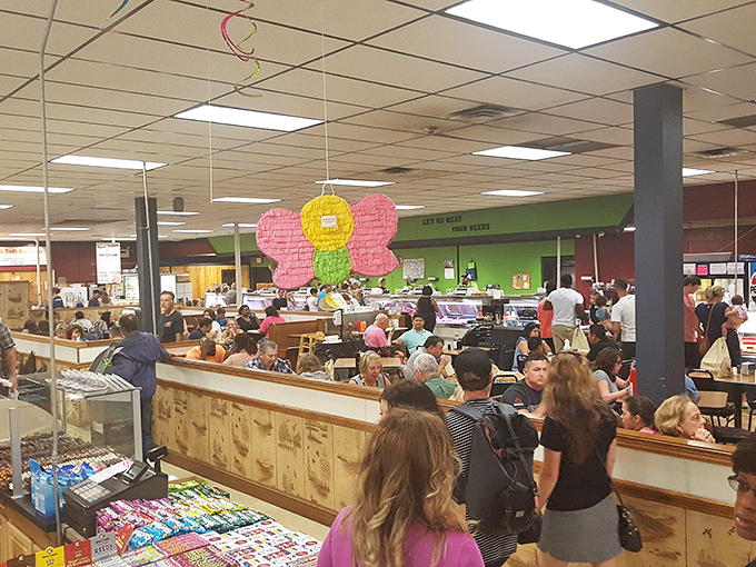 The food court buzzes with hungry shoppers. That pink butterfly decoration isn't just decor&mdash;it's a symbol of the metamorphosis your taste buds are about to experience.