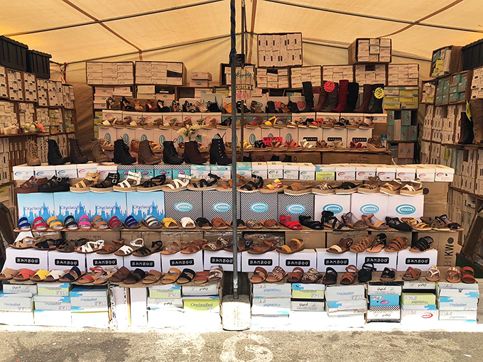Shoe paradise or footwear museum? Rows upon colorful rows of sandals, boots, and everything in between await their perfect match.