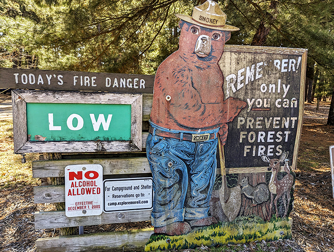 Smokey Bear stands guard with his timeless message. That stern look says, "I've seen what happens when someone gets careless with the s'mores."